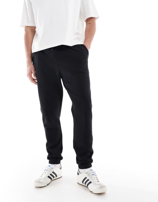 ASOS DESIGN essential slim trackies in black | ASOS