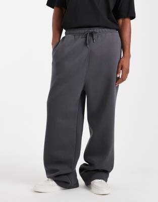 ASOS DESIGN essentials wide leg trackies in washed black | ASOS