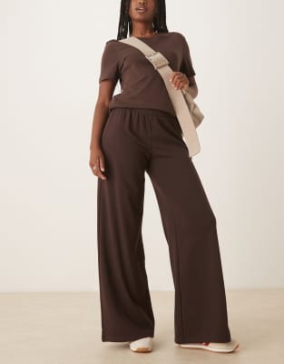 ASOS DESIGN extreme wide leg low rise trackies in dark brown | ASOS