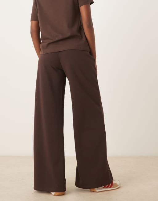 ASOS DESIGN extreme wide leg low rise trackies in dark brown | ASOS