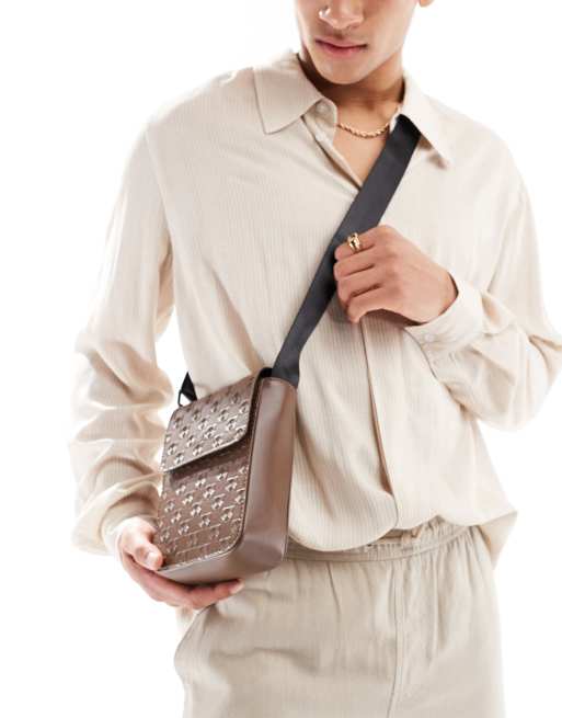 ASOS DESIGN faux leather cross body bag with monogram in brown | ASOS