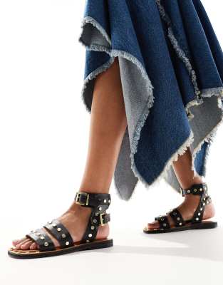 ASOS DESIGN - Fiji - Sandali bassi in pelle con borchie neri | ASOS