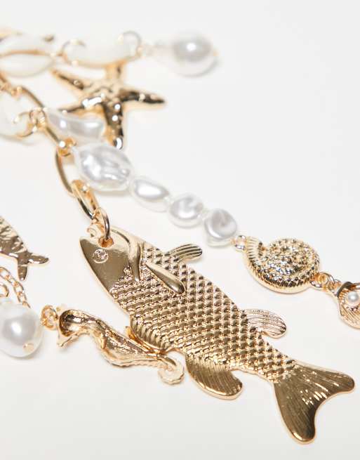 ASOS DESIGN fish & faux shell bag charm in gold | ASOS