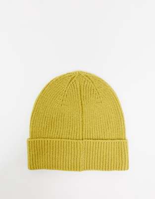 ASOS DESIGN fisherman rib beanie hat in polyester in mustard | ASOS