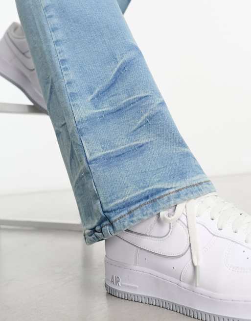 ASOS DESIGN flare jeans with distressed wash | ASOS