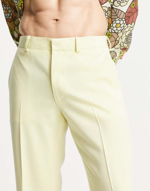 ASOS DESIGN flared smart pants in pastel yellow | ASOS