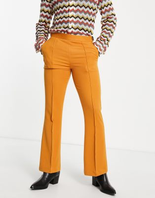 ASOS DESIGN flared smart trousers with elasticated waist band in tobacco brown | ASOS