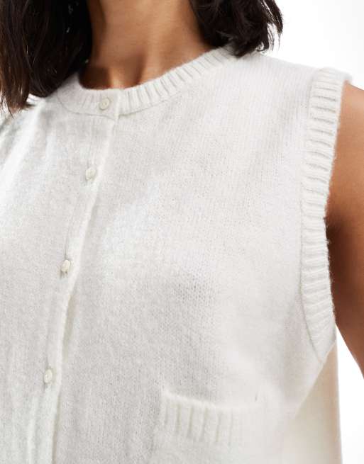 ASOS DESIGN fluffy knit vest with patch pockets in cream | ASOS