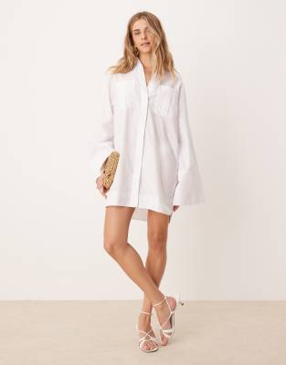ASOS DESIGN - Gestreepte mini overhemdjurk met brede manchetten en oversized zakken in wit | ASOS