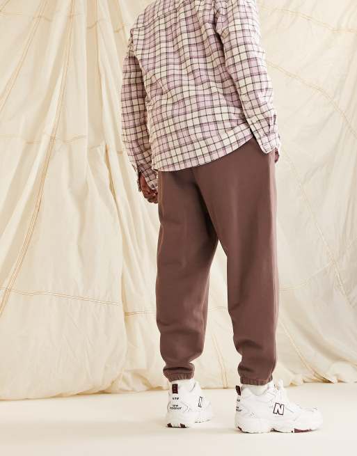 ASOS DESIGN heavyweight oversized trackies in washed brown | ASOS