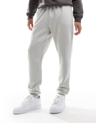 ASOS DESIGN heavyweight skinny trackies in scuba-style fabric in grey ...