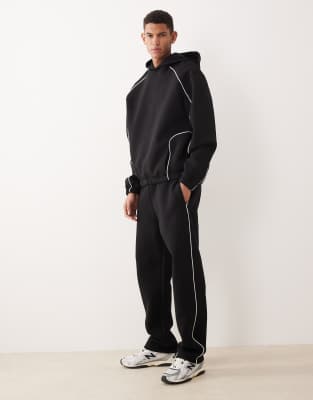 ASOS DESIGN heavyweight straight leg trackies with side piping in black ...