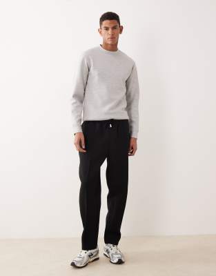 ASOS DESIGN heavyweight tapered fit trackies in black in scuba-style ...