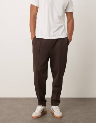 ASOS DESIGN heavyweight tapered trackies in scuba-style fabric in brown ...