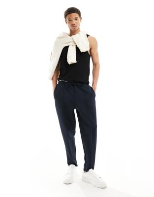 ASOS DESIGN heavyweight tapered trackies in scuba-style fabric in navy ...