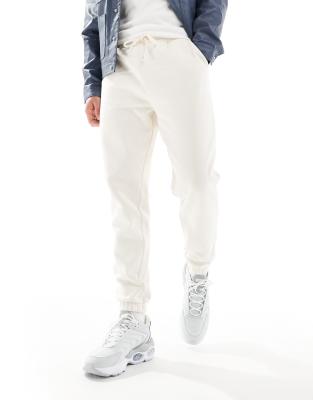 ASOS DESIGN heavyweight tapered trackies in white | ASOS