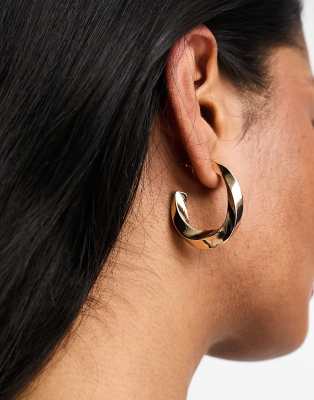 ASOS DESIGN hoop earrings with twist oval design in gold tone | ASOS