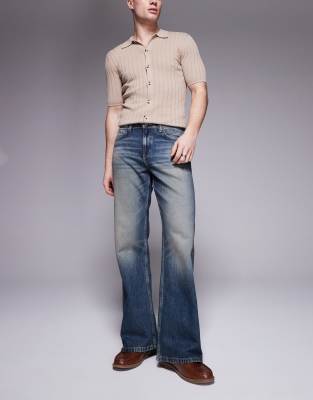 ASOS DESIGN - Jean évasé ample - Bleu délavé moyen teinté | ASOS