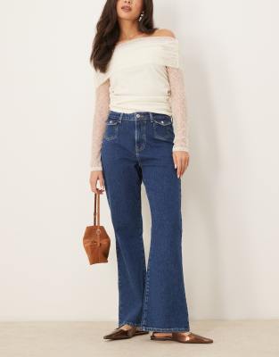 ASOS DESIGN - Jean évasé stretch avec détails aux poches - Indigo | ASOS