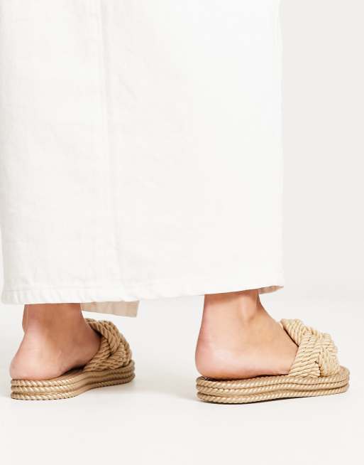 ASOS DESIGN Jinx knot jelly sandals in gold | ASOS