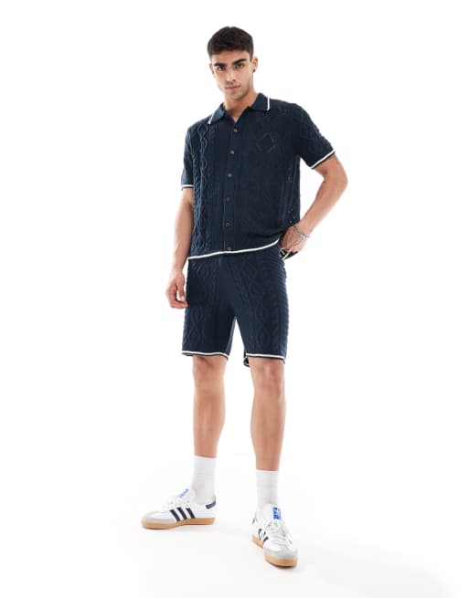 ASOS DESIGN knit spliced cable and pointelle stitch button up polo ...