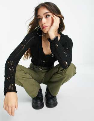 ASOS DESIGN lace up sweater with ladder stitch detail in black | ASOS