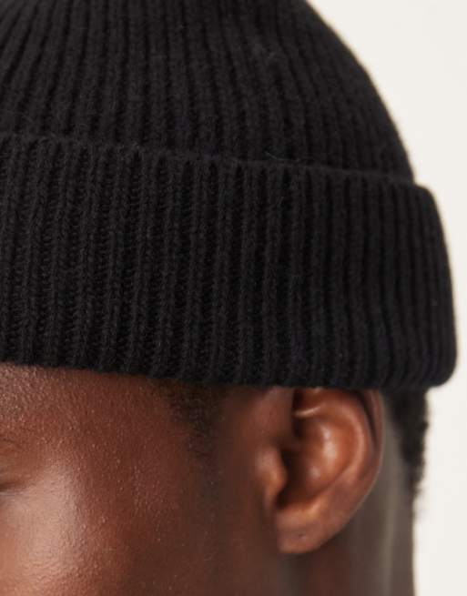 ASOS DESIGN lambswool fisherman ribbed beanie in black | ASOS