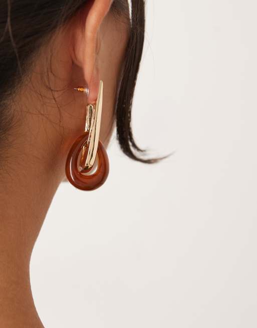 ASOS DESIGN large studs with amber loop detail in gold tone | ASOS