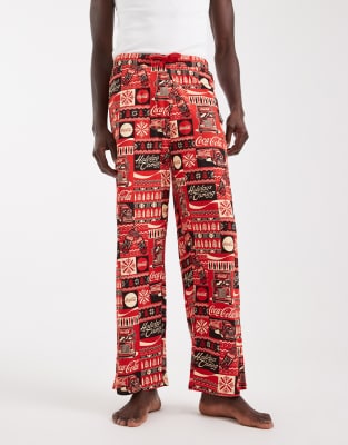 ASOS DESIGN – Lounge-Hose in Rot mit weihnachtlicher Coca-Cola-Grafik ...