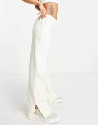 ASOS DESIGN low rise straight leg trackies with pintuck in buttermilk ...