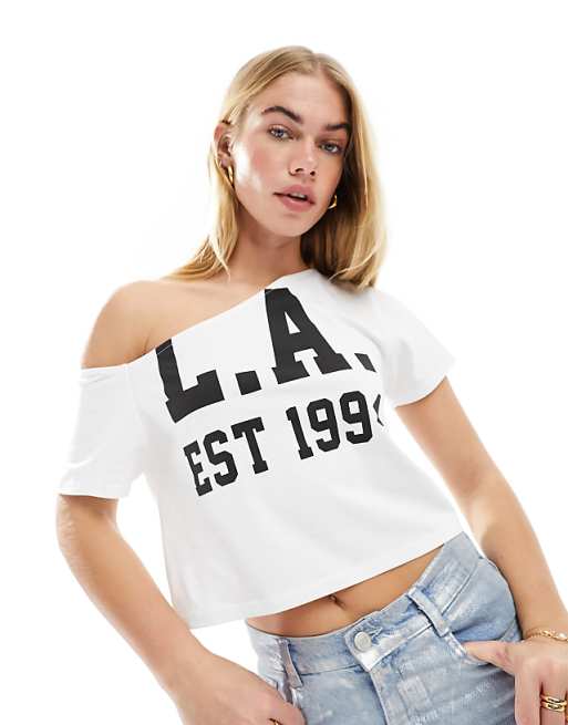 ASOS DESIGN – Luźny top w kolorze kości słoniowej z odkrytymi ramionami ... ASOS DESIGN – Luźny top w kolorze kości słoniowej z odkrytymi ramionami ...