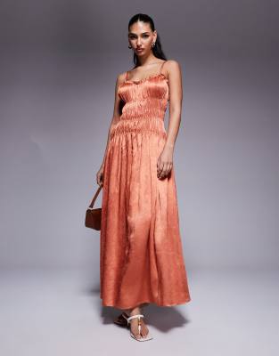 ASOS DESIGN - Maxi-jurk met gesmokt lijfje van satijn in oranje | ASOS
