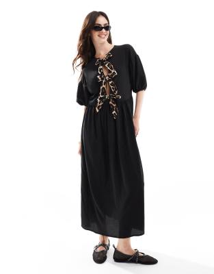 ASOS DESIGN - Maxi jurk met pofmouwen en gestrikte voorkant in zwart | ASOS