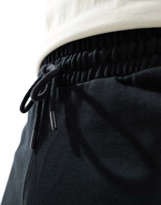 ASOS DESIGN mid length slim shorts in black | ASOS