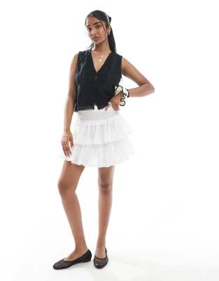 ASOS DESIGN - Mini-jupe à froufrous et détails en dentelle - Blanc | ASOS