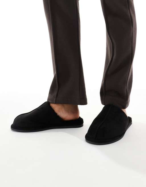 ASOS DESIGN mule slippers in black with faux shearling lining | ASOS