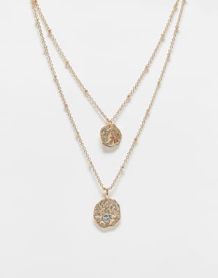 ASOS DESIGN multi-row necklace with chain and celestial designs in gold ...