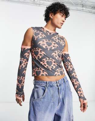 ASOS DESIGN muscle long sleeve t-shirt with cut outs in all over print ...
