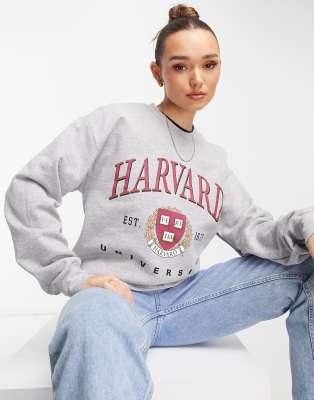 ASOS DESIGN – Oversize-Sweatshirt in Grau meliert mit lizenziertem Harvard-Grafikprint | ASOS