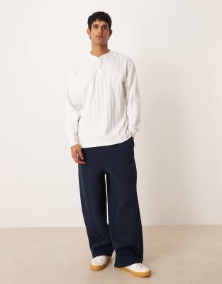 ASOS DESIGN oversized balloon trackies with pin tuck in navy | ASOS