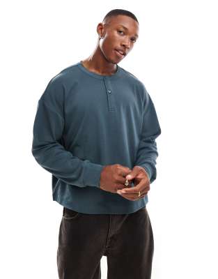 ASOS DESIGN oversized boxy long sleeve t-shirt with henley neck in green rib | ASOS
