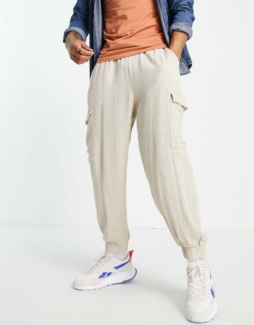 Asos Design Oversized Broek Met Toelopende Pijpen En Cargozakken In