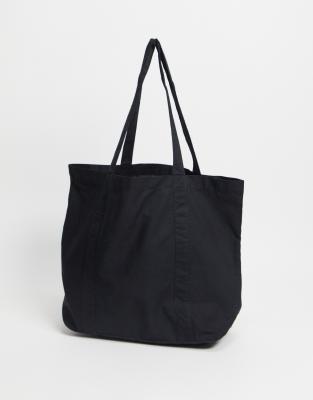 ASOS DESIGN oversized cotton tote bag in black | ASOS