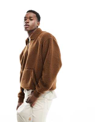 ASOS DESIGN oversized half zip rugby polo in tan borg with pocket ...