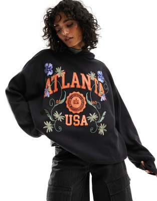 ASOS DESIGN oversized hoodie with embroidered atlanta graphic in black ...