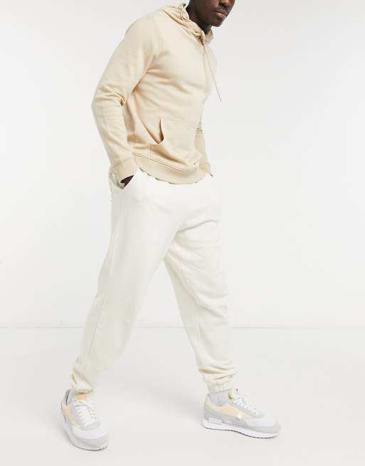 ASOS DESIGN oversized joggers with thin waistband in beige | ASOS