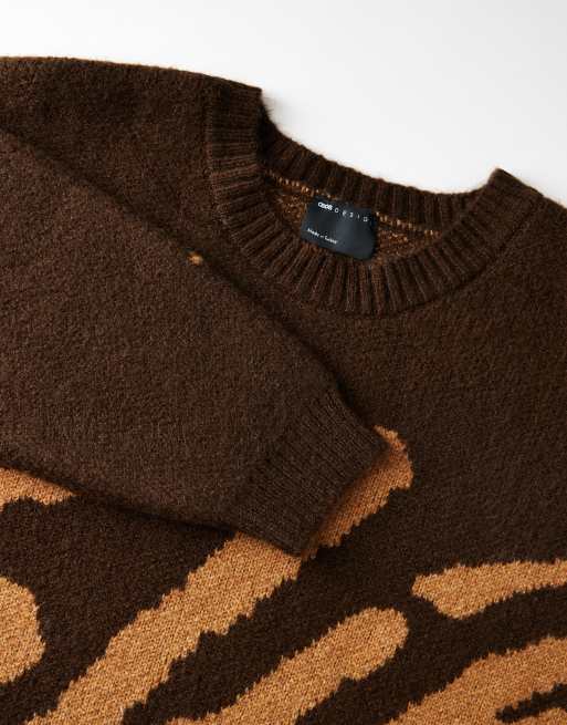 ASOS DESIGN oversized knit sweater with chest graphic in brown | ASOS