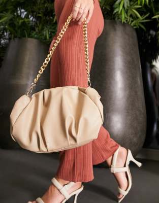 ASOS DESIGN oversized ruched clutch in beige with detachable shoulder ...