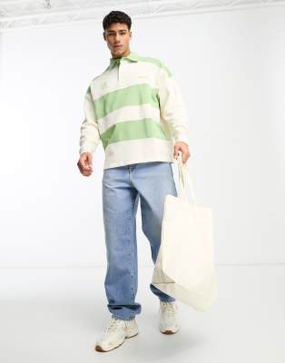 ASOS DESIGN oversized rugby polo sweatshirt in green with sports print ...