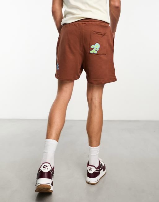 ASOS DESIGN oversized shorts in brown with multiplacement puff print | ASOS